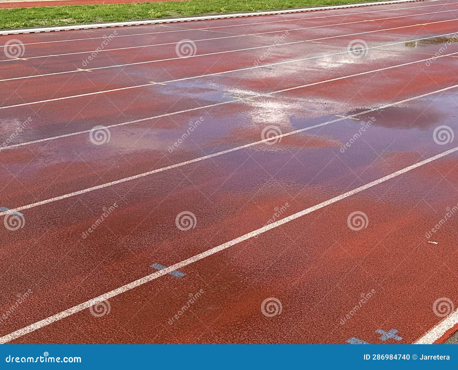 Wet running track stock photo. Image of running, illustrative - 286984740