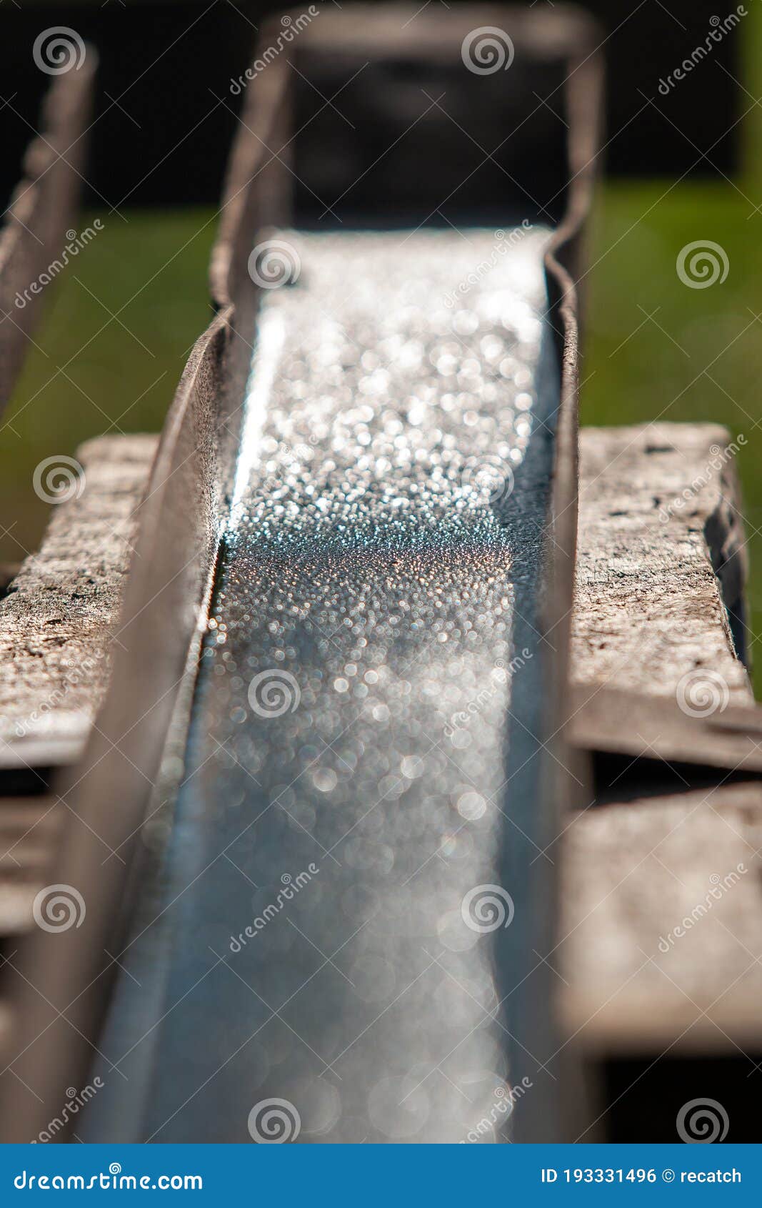 Wet Rusty Channel on a Wooden Workbench Stock Photo - Image of closeup ...