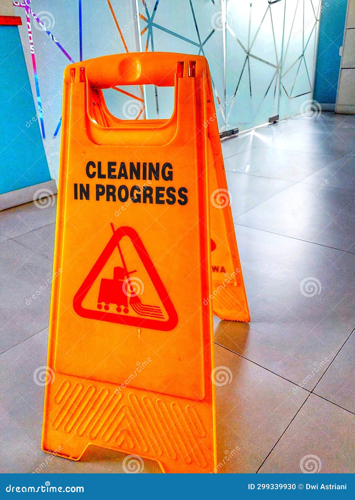 A Wet and Slippery Sign Board Stands on the Workroom Floor Stock Photo ...
