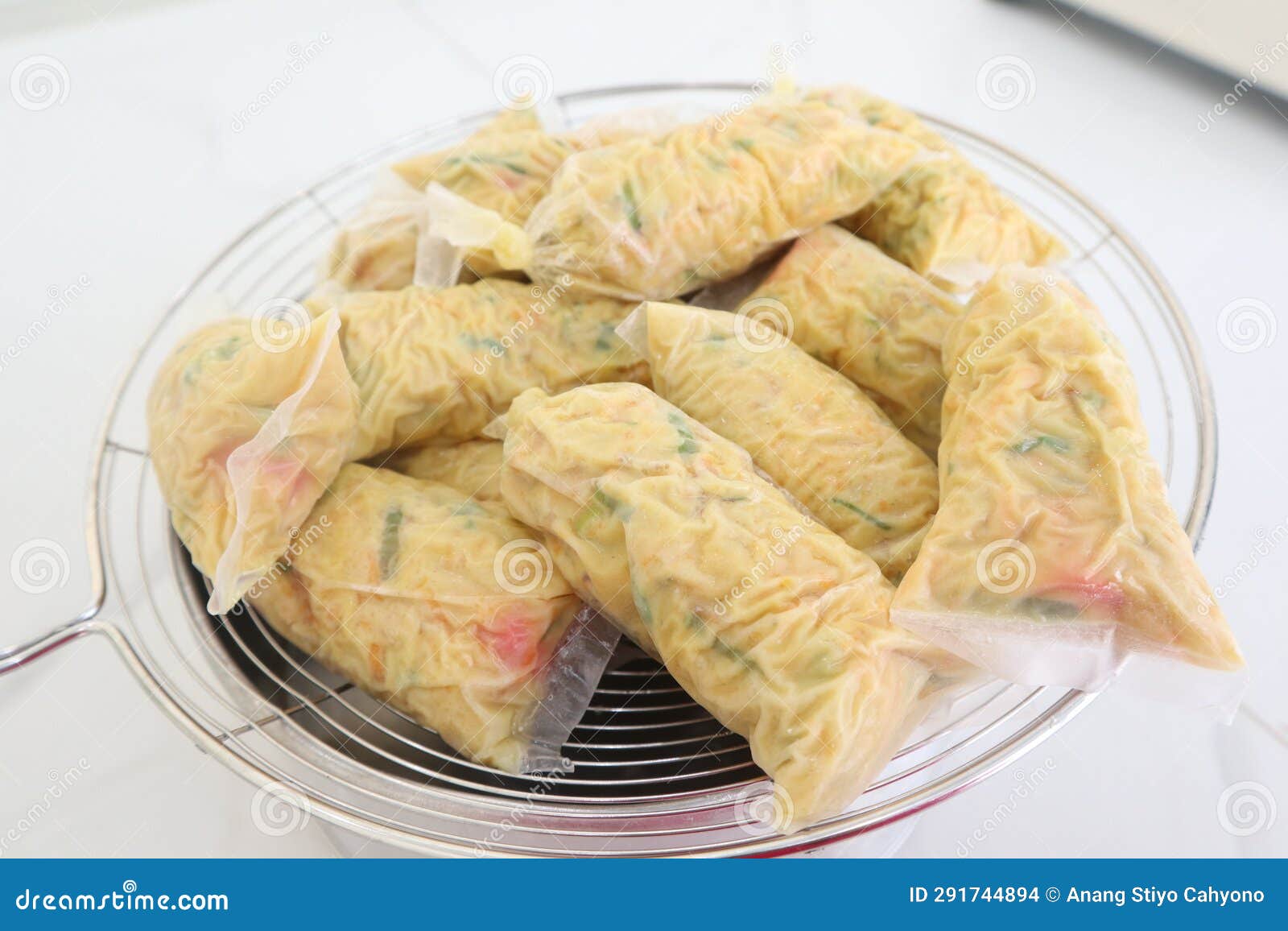 Wet Spring Rolls are Placed on a White Ceramic Plate Stock Photo ...
