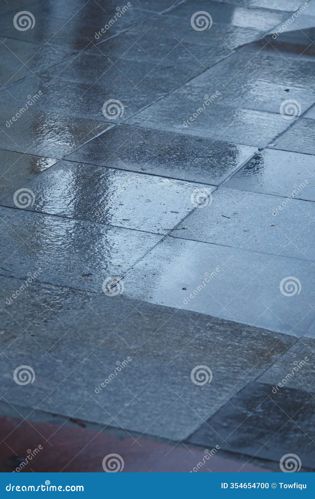 Wet Tiles Displaying Reflections Beautifully on a Surface during Rain ...