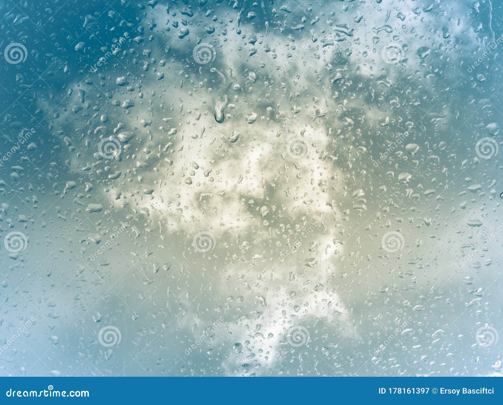 Wet Window with Rain Drops and a Cloudy Sky Outside Stock Image - Image ...