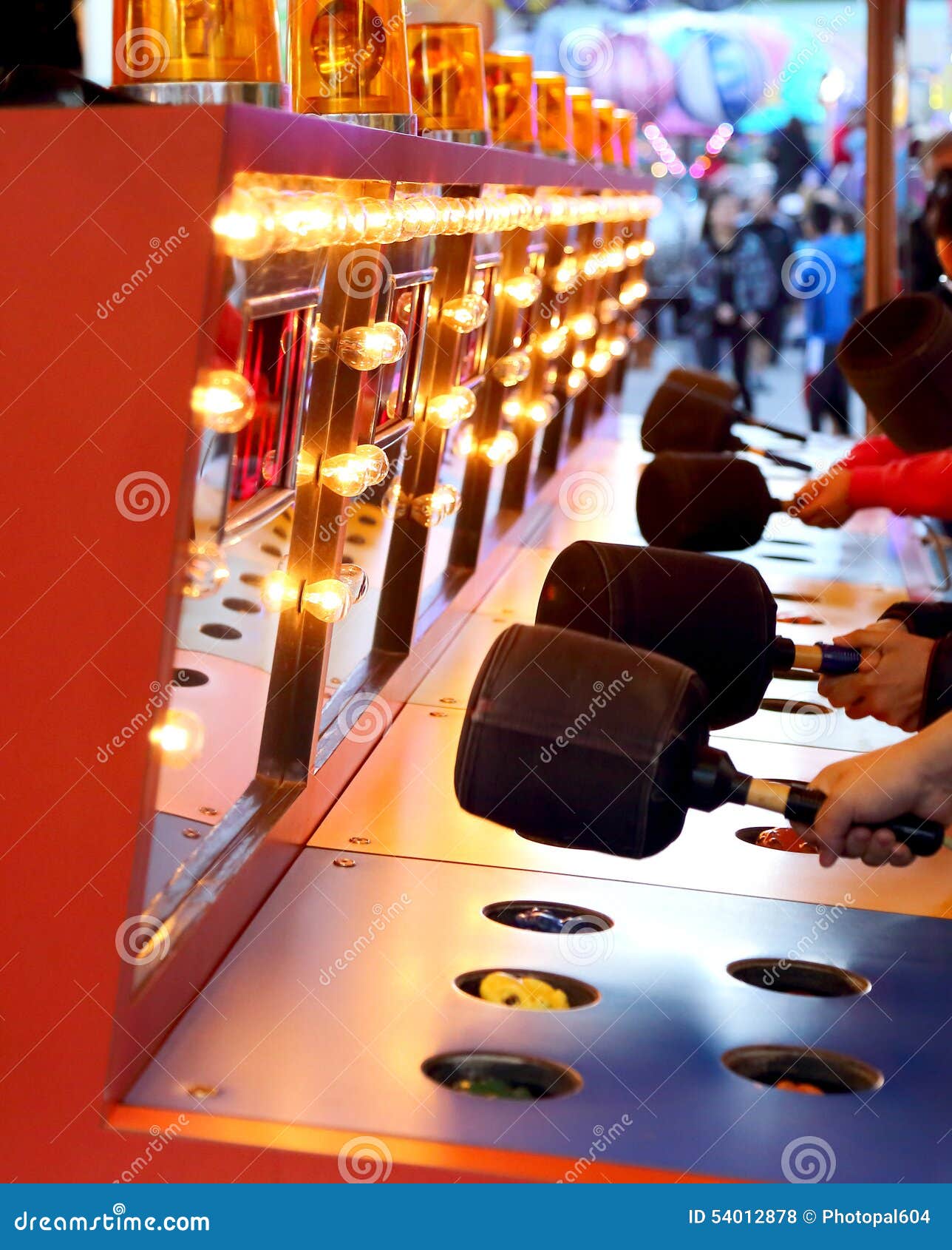 A Whacking Game at Carnival Stock Photo - Image of summer, booth: 54012878