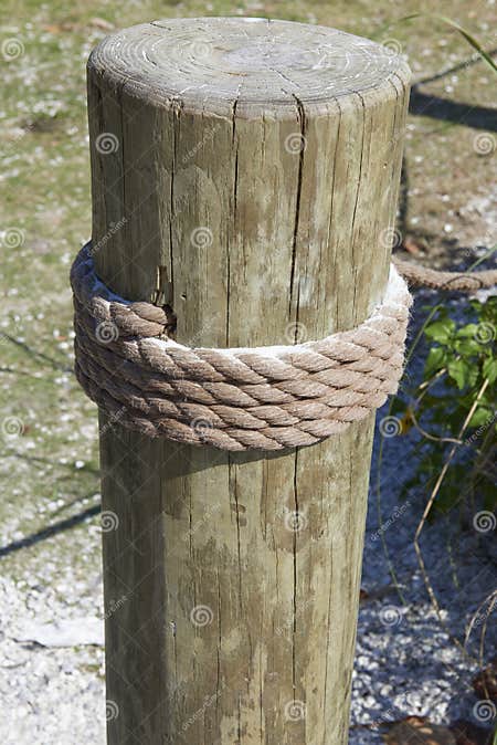 Wharf-dock Post with Rope Attached Stock Photo - Image of stanchion ...