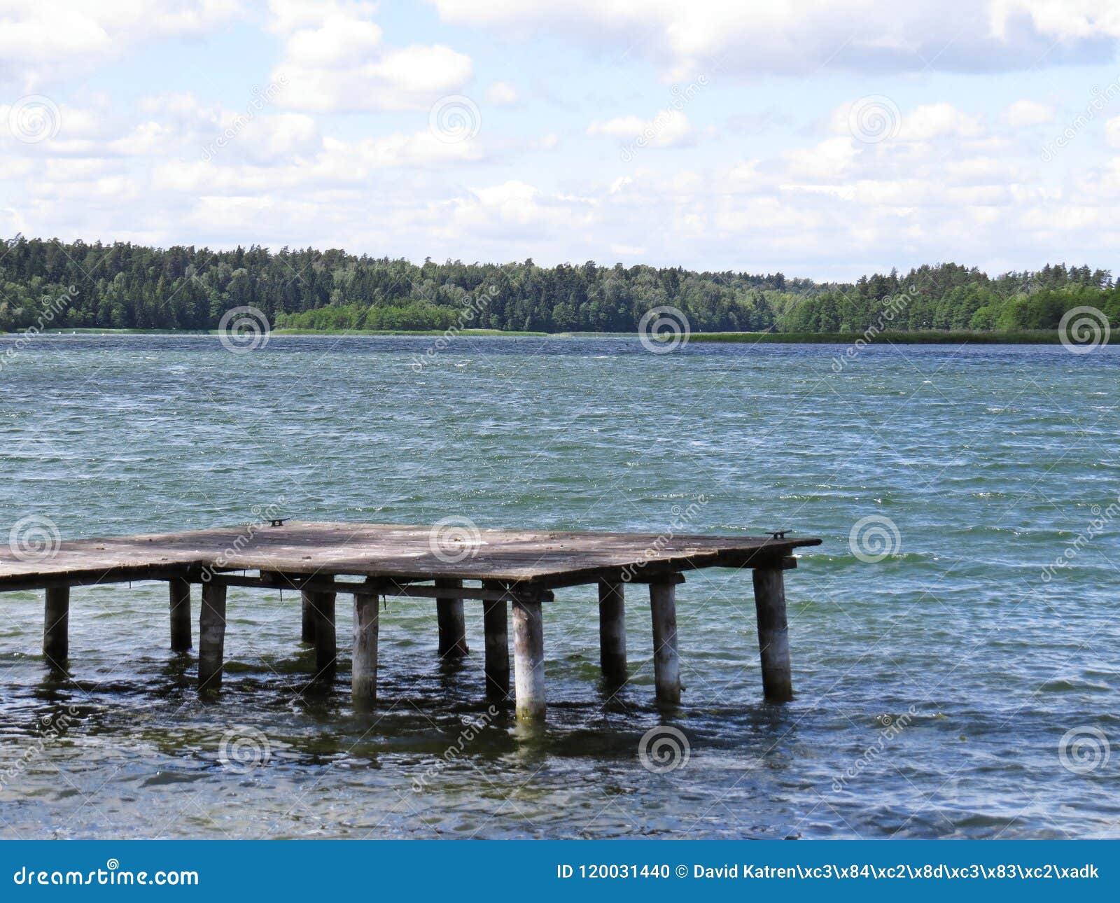 Wharf Pier Catwalk on Lake with Clouds on Sky in Background Stock Photo ...