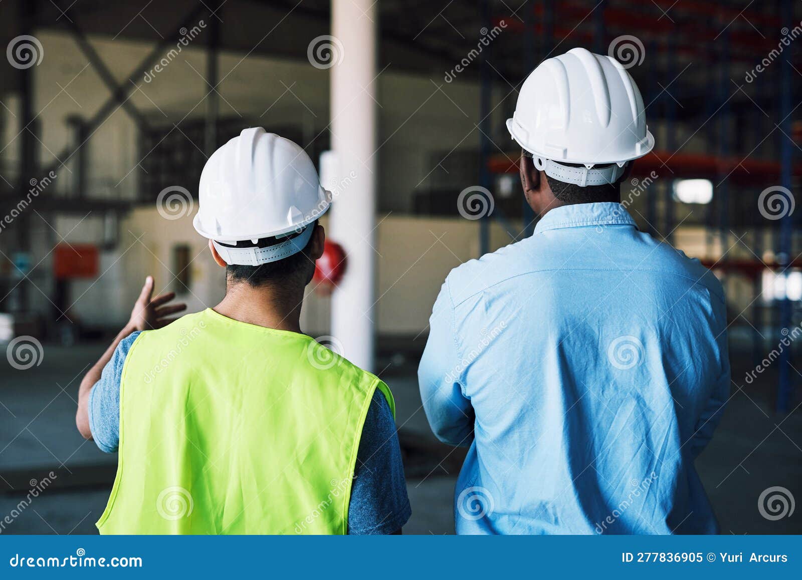 What the Client Wants, the Client Gets. Two Builders Inspecting a ...