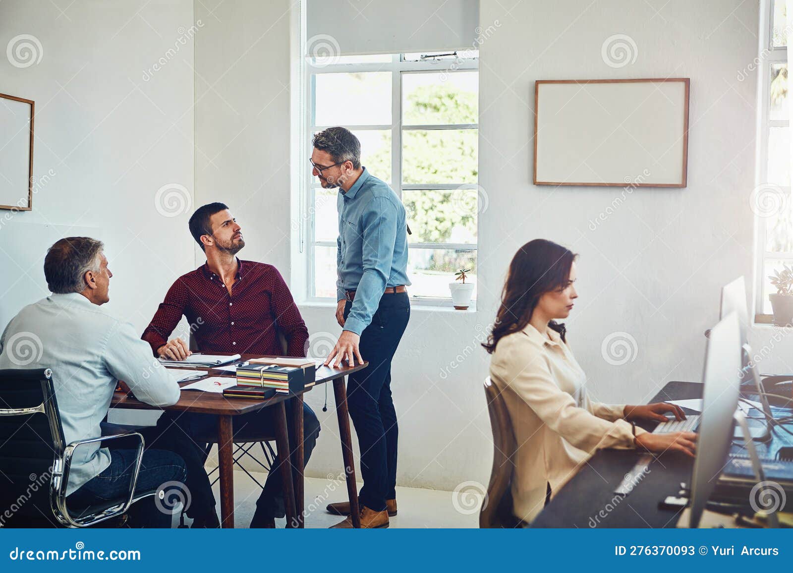 This is What a Creative Office Looks Like. a Group of Colleagues ...