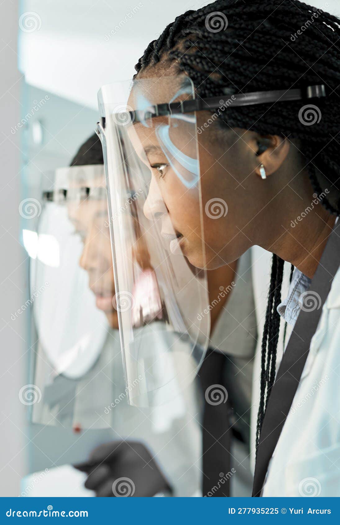 What Do we Have Here. Two Scientists Wearing Face Shields while Working ...