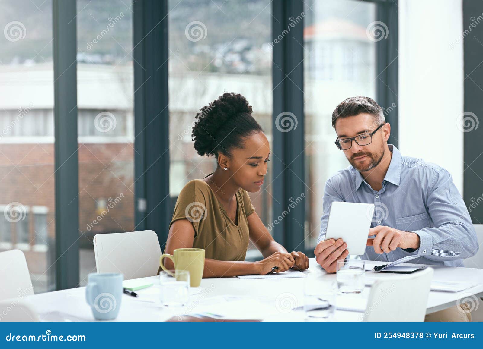 What Do You Think of these Changes that I Made. Two Colleagues Working ...