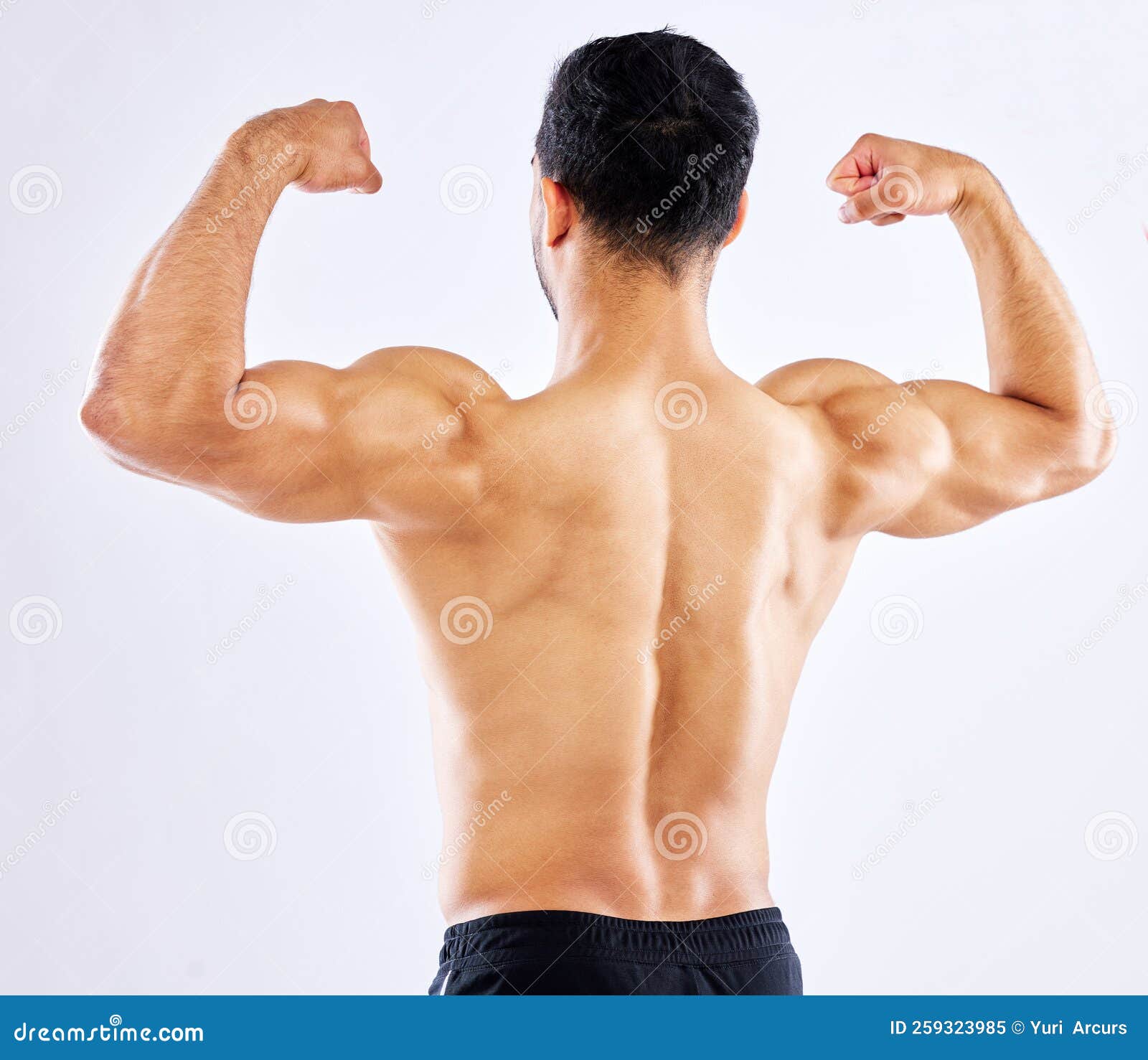 What Do You Think about these Muscles. a Man Flexing His Arm and Back ...