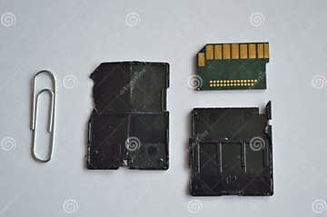 Inside an SD Card with Paperclip Scale Measure Stock Photo - Image of ...