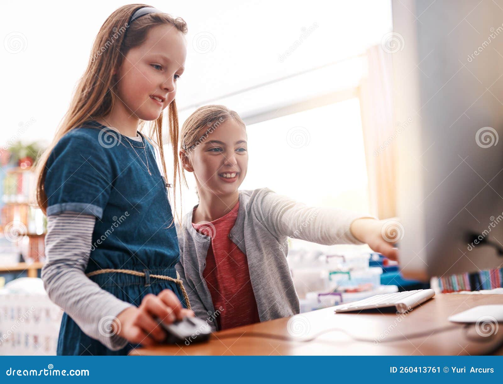 What Does that Mean. Two Elementary School Children Browsing on a ...