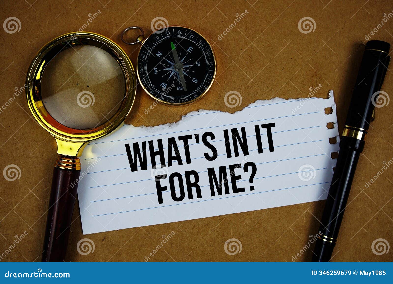 What S in it for Me? Text on Paper Torn with Compass and Magnifying ...