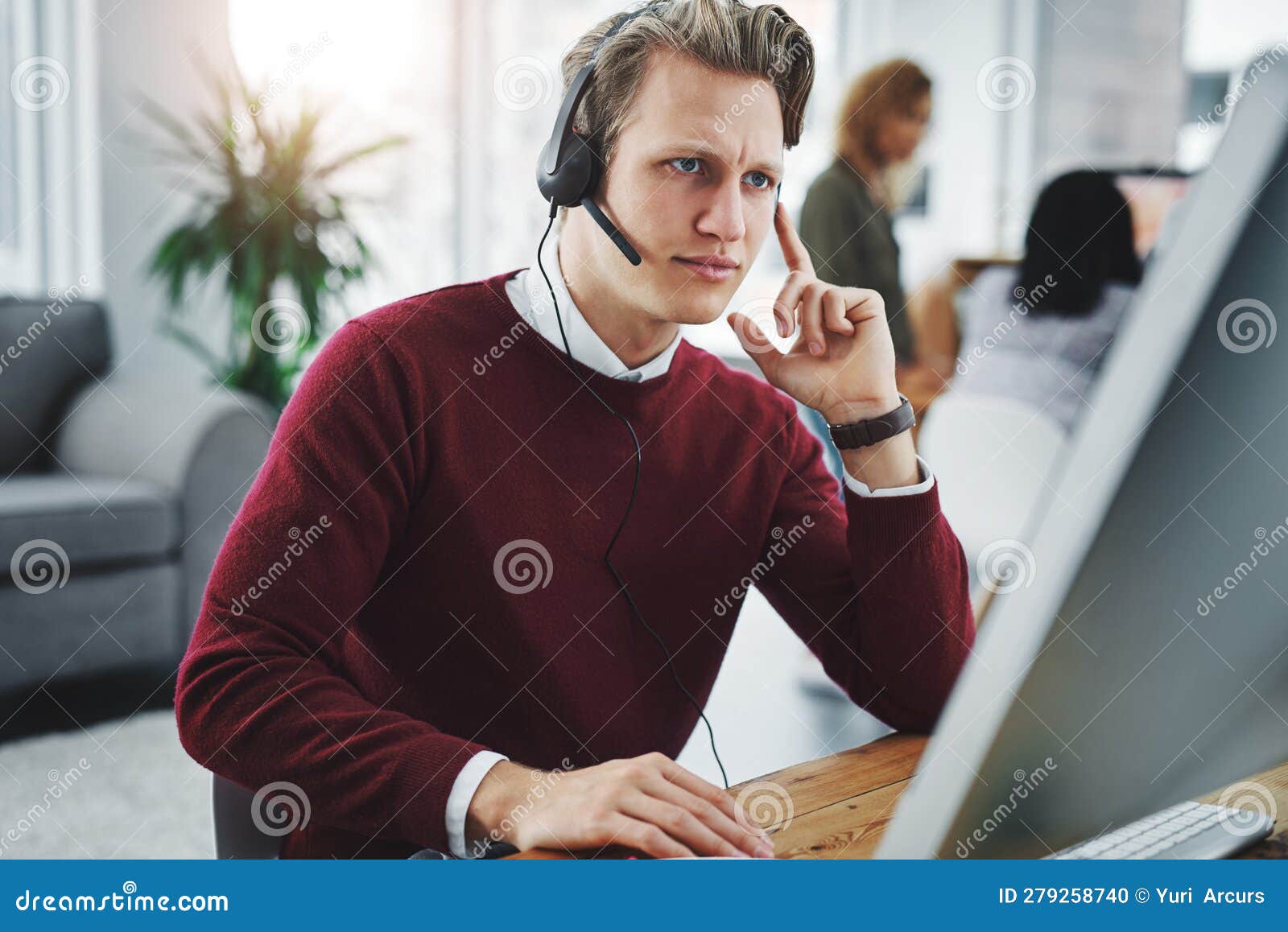 What Seems To Be the Problem. a Young Man Using a Headset and Computer ...