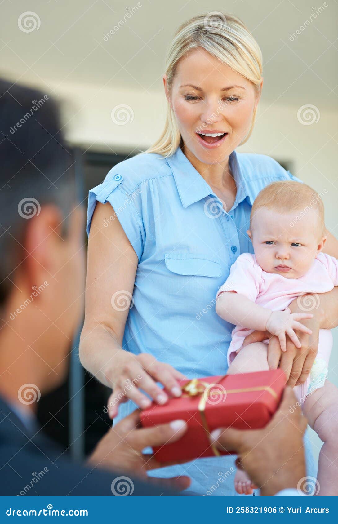What a Surprise. a Man Surprising His Wife with a Gift. Stock Photo ...