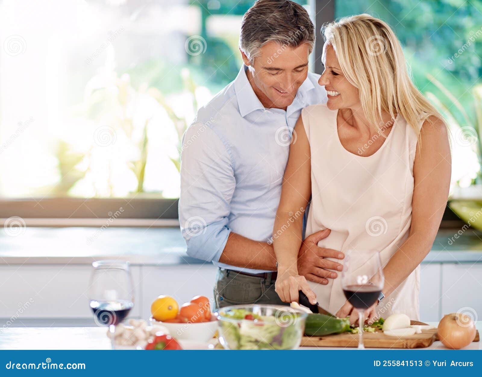 What You Making. an Affectionate Mature Couple Cooking Dinner Together ...