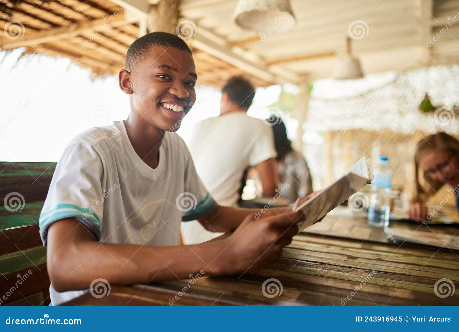 Whats on the Menu. Portrait of a Young Man Reading a Menu in a ...