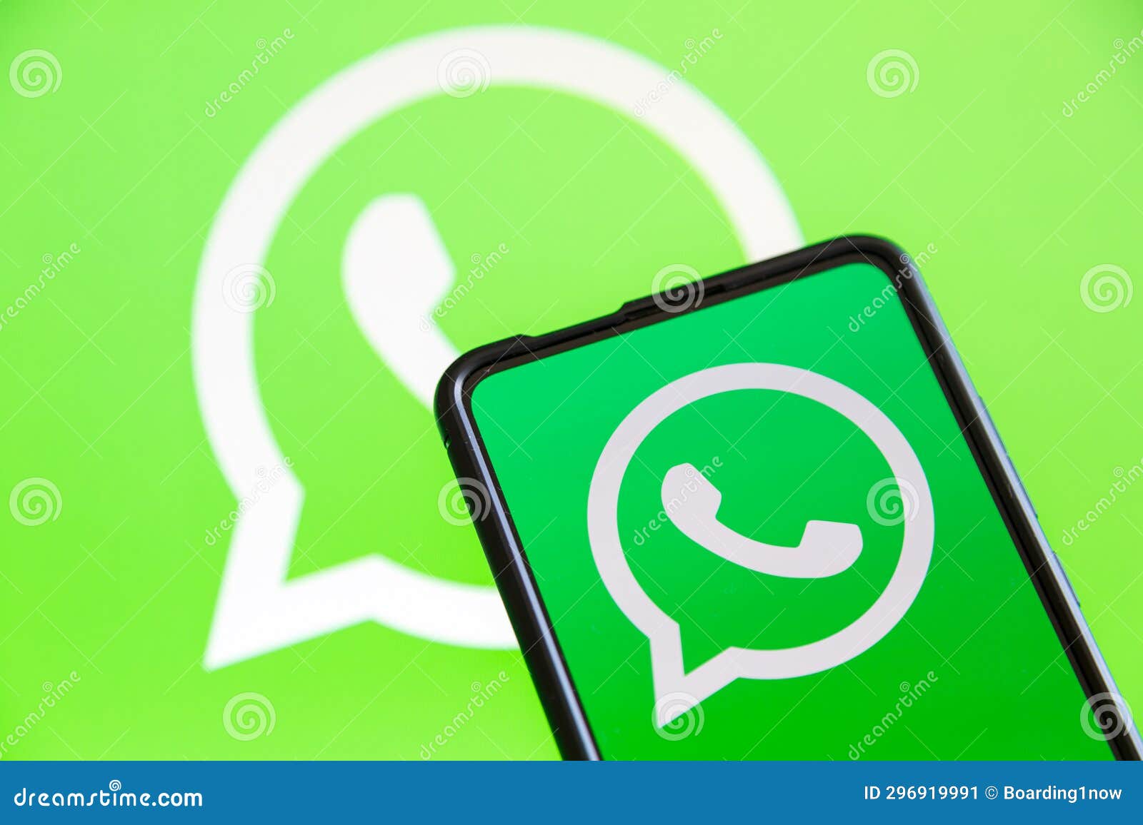 WhatsApp Logo Messenger App on a Mobile Phone and Computer Screen ...