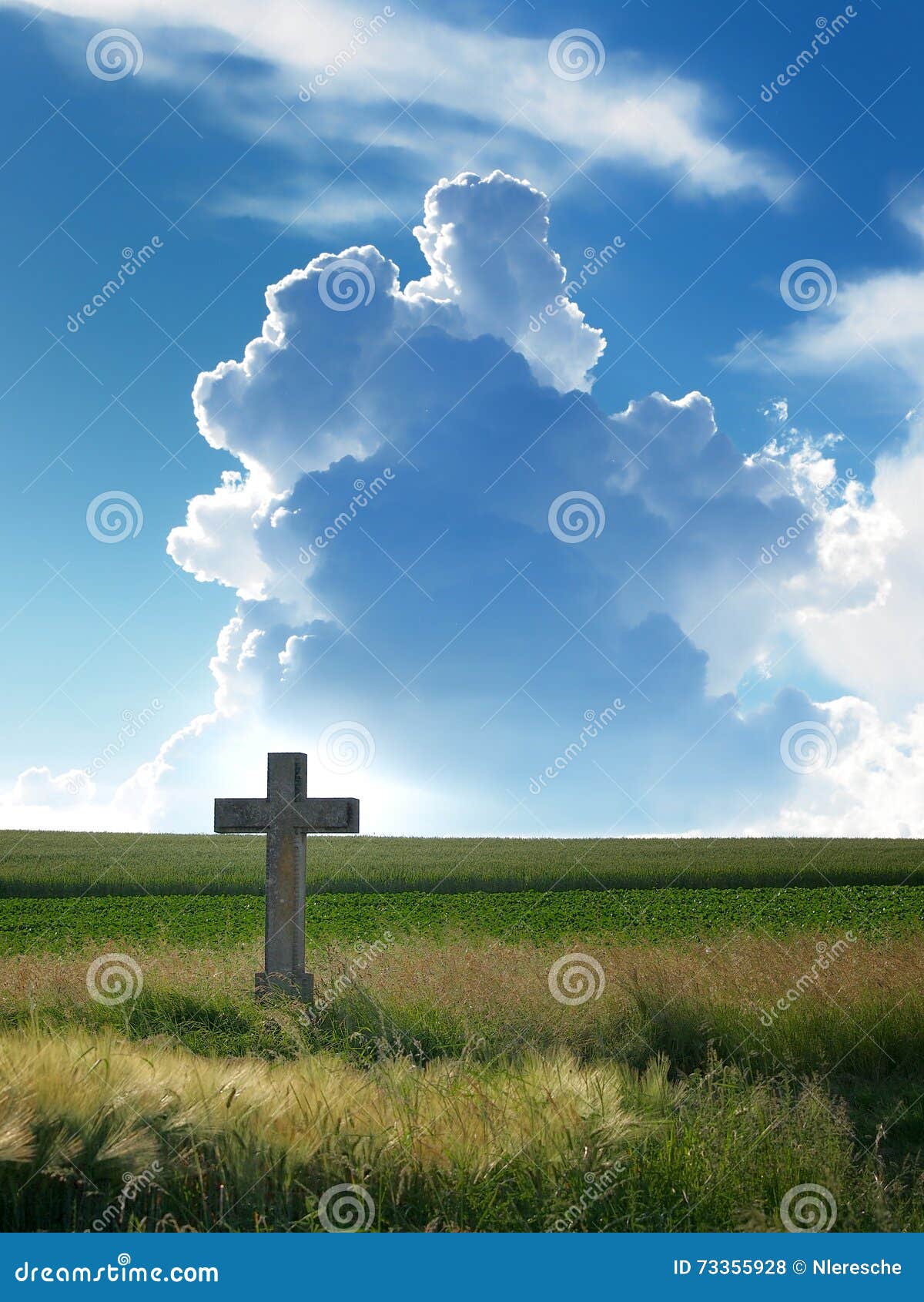 Wheat Field with Cross and Cloudy Sky Stock Photo - Image of stone ...