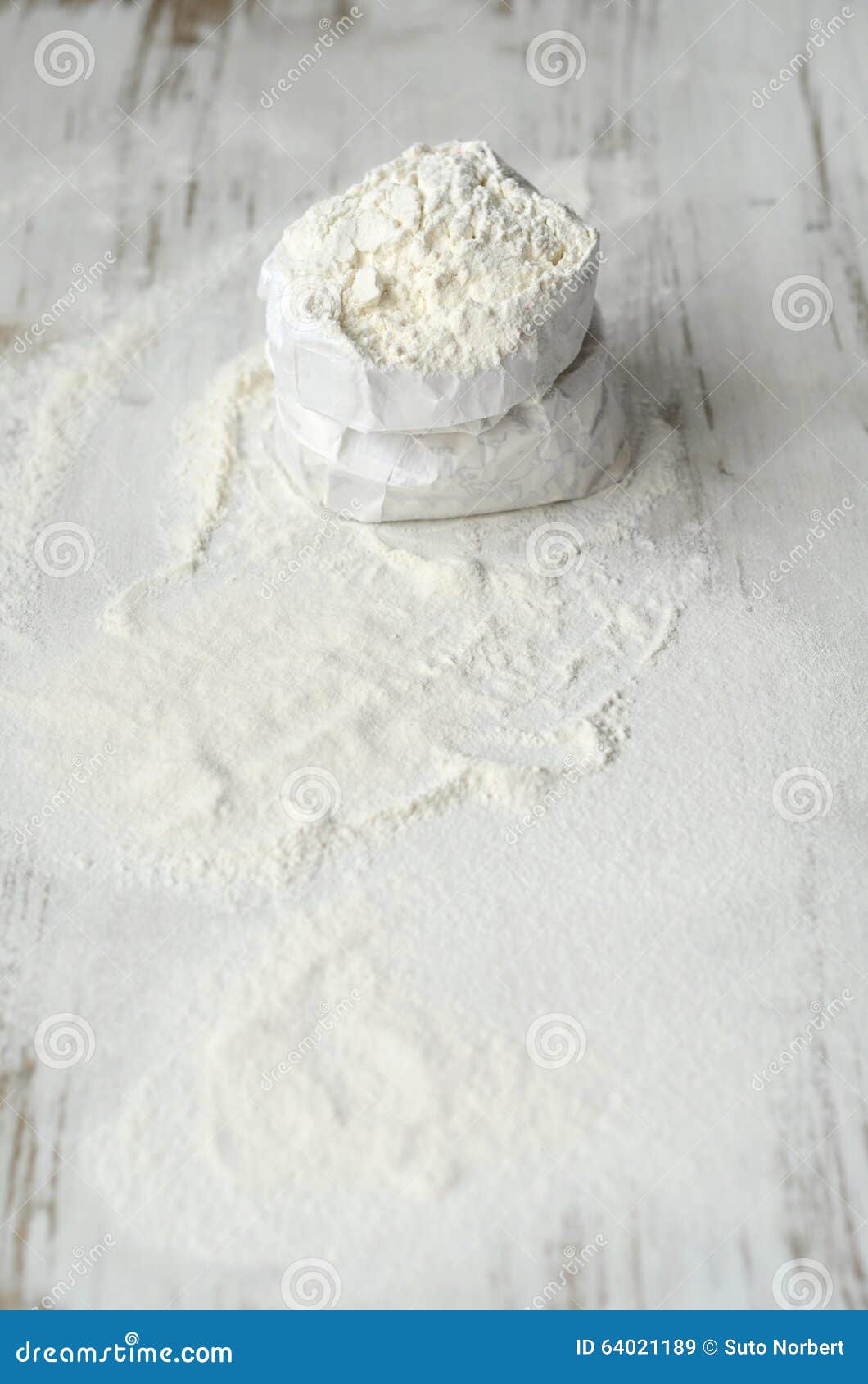 Wheat flour on the table stock image. Image of cake, pile - 64021189