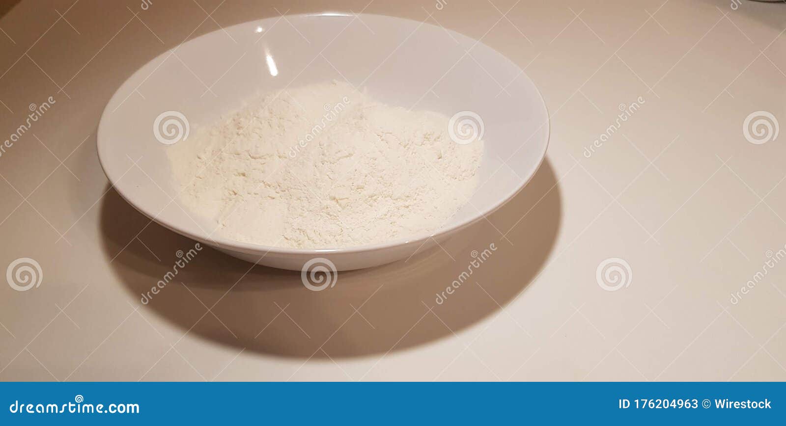 Wheat Flour on a White Plate on the Table Stock Image - Image of food ...
