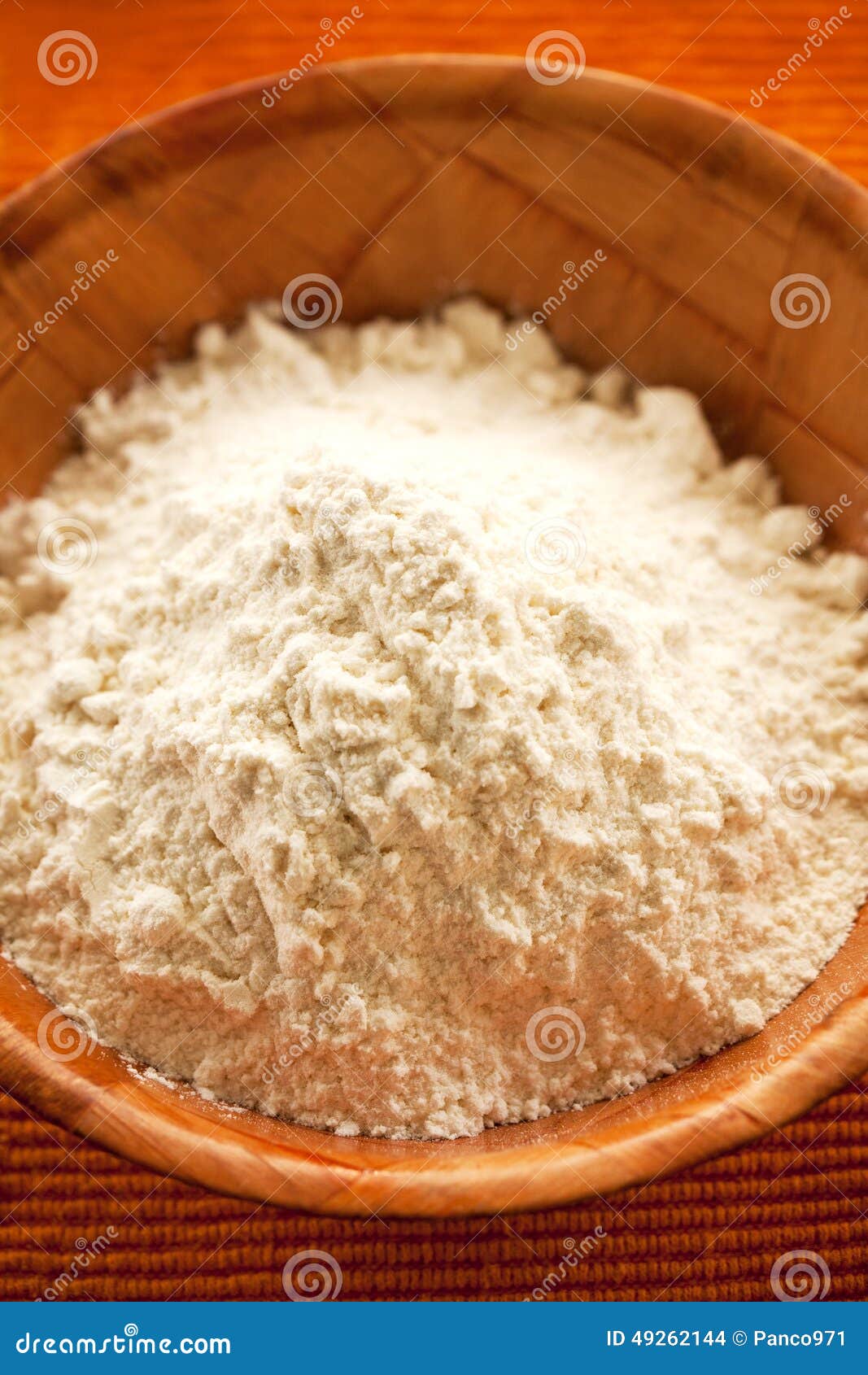 Wheat flour in wooden bowl stock photo. Image of cooking - 49262144