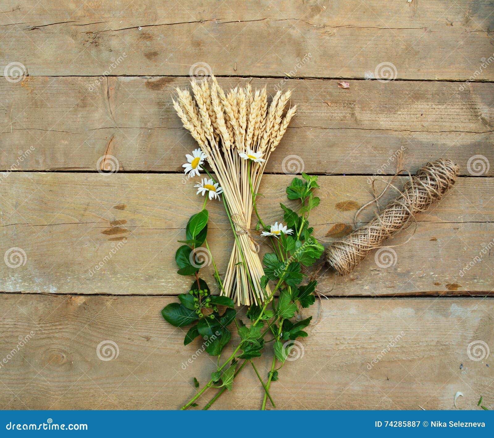Wheat, String and Daisies on a Wooden Background Stock Image - Image of ...
