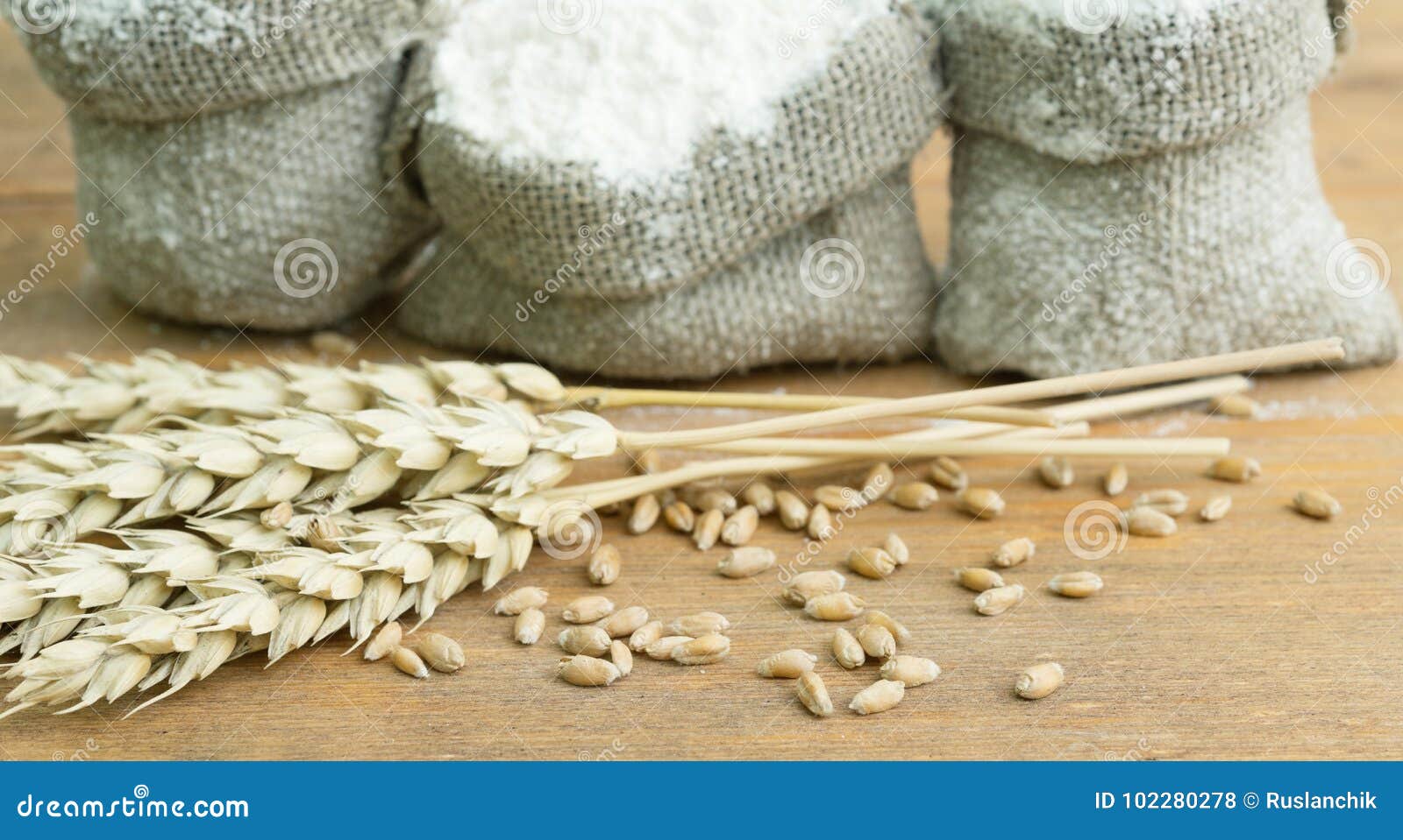 Wheat on table stock photo. Image of wooden, natural - 102280278