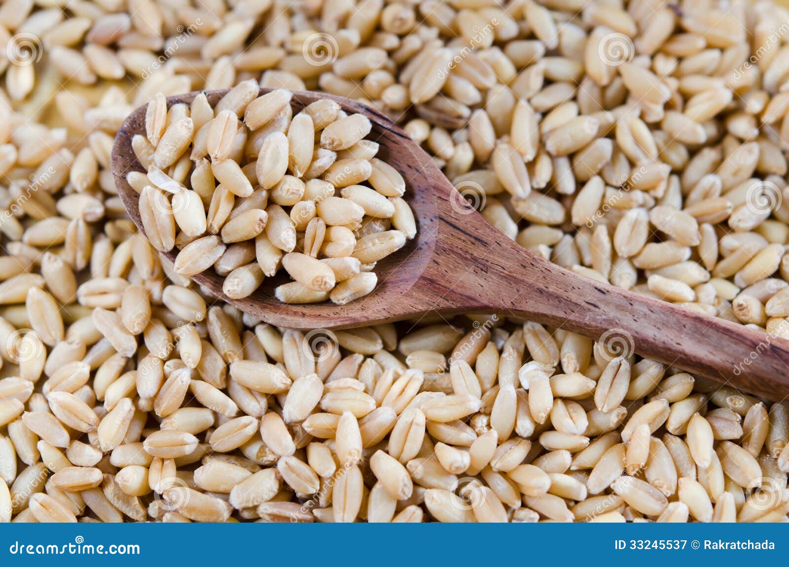 Wheat and wooden spoon stock image. Image of texture - 33245537