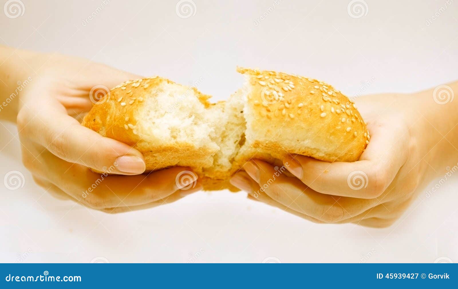 Wheaten roll in hands stock image. Image of roll, products - 45939427