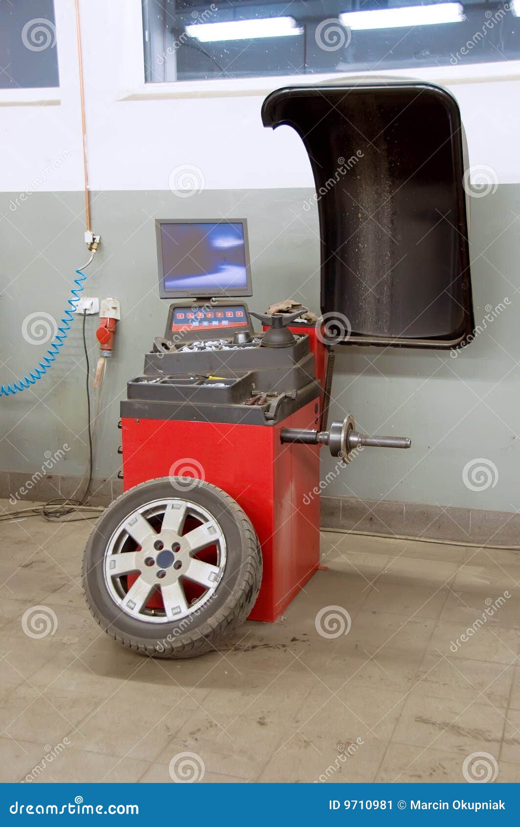 Wheel balancing machine stock image. Image of vulcanization - 9710981