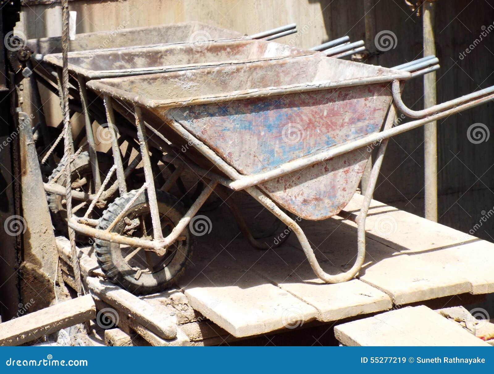Wheel barrow stock image. Image of wheelbarrow, concrtete - 55277219