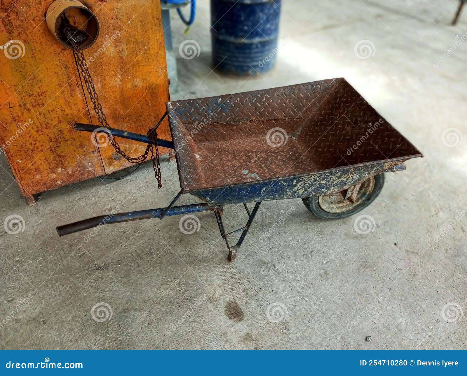 A Wheel Barrow at Work Site Stock Photo - Image of work, wheel: 254710280