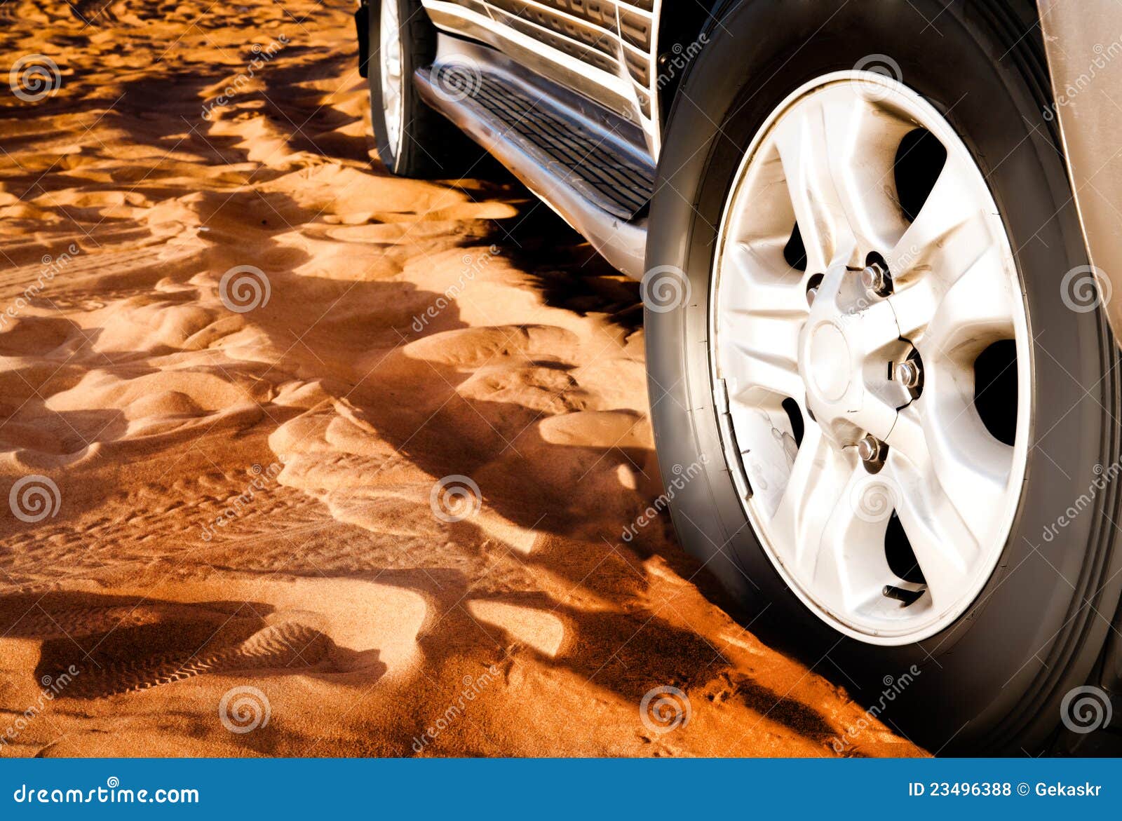 Wheel of a car on the sand stock photo. Image of ground - 23496388