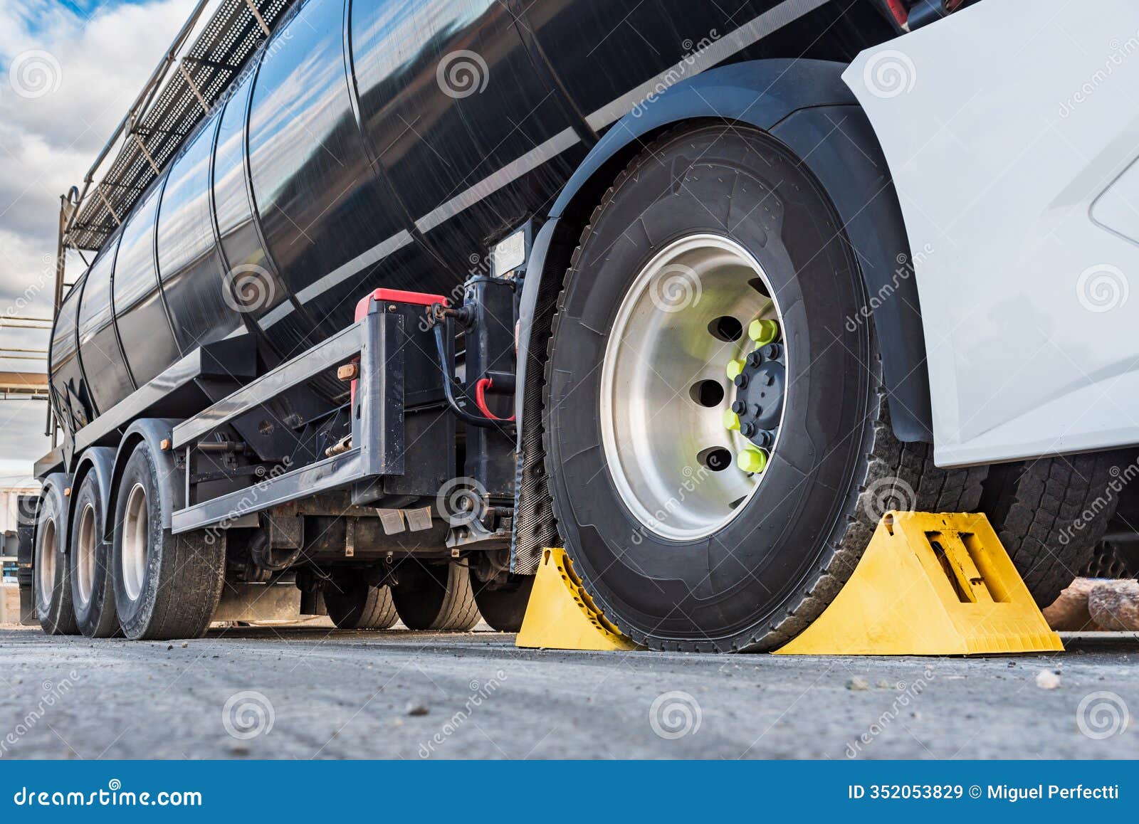 Wheel Chocks Placed on the Drive Wheel of a Tanker Truck To Immobilize ...