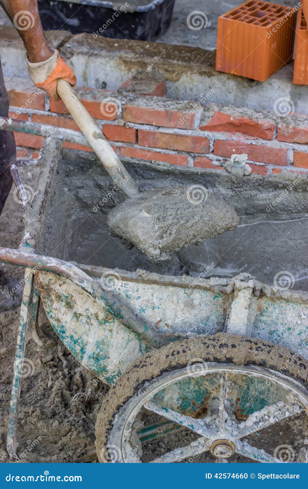 2 Wheel Concrete Cart with Concrete and Shovel Stock Photo - Image of ...