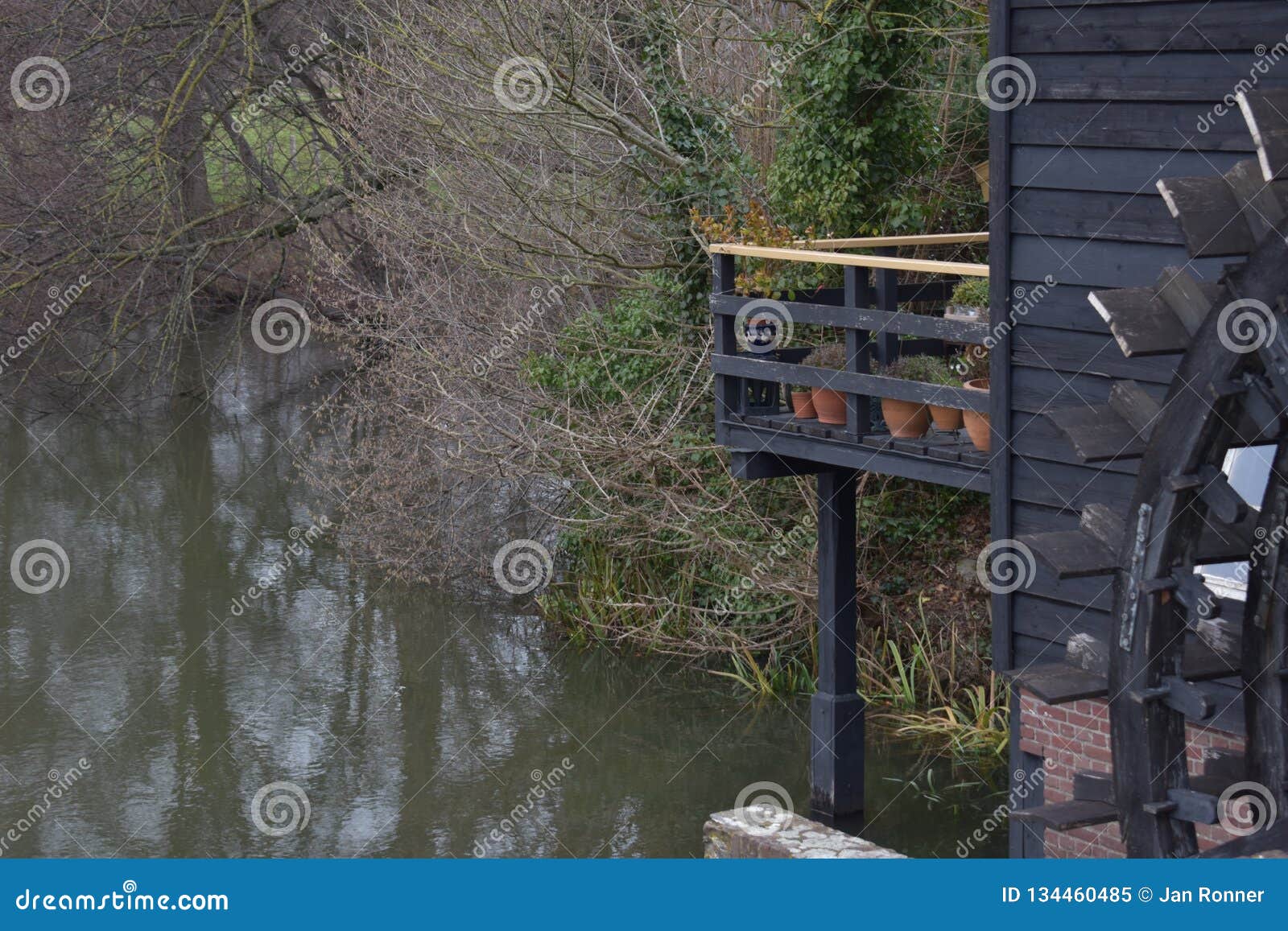 Wheel of a Dutch watermill stock image. Image of mill - 134460485