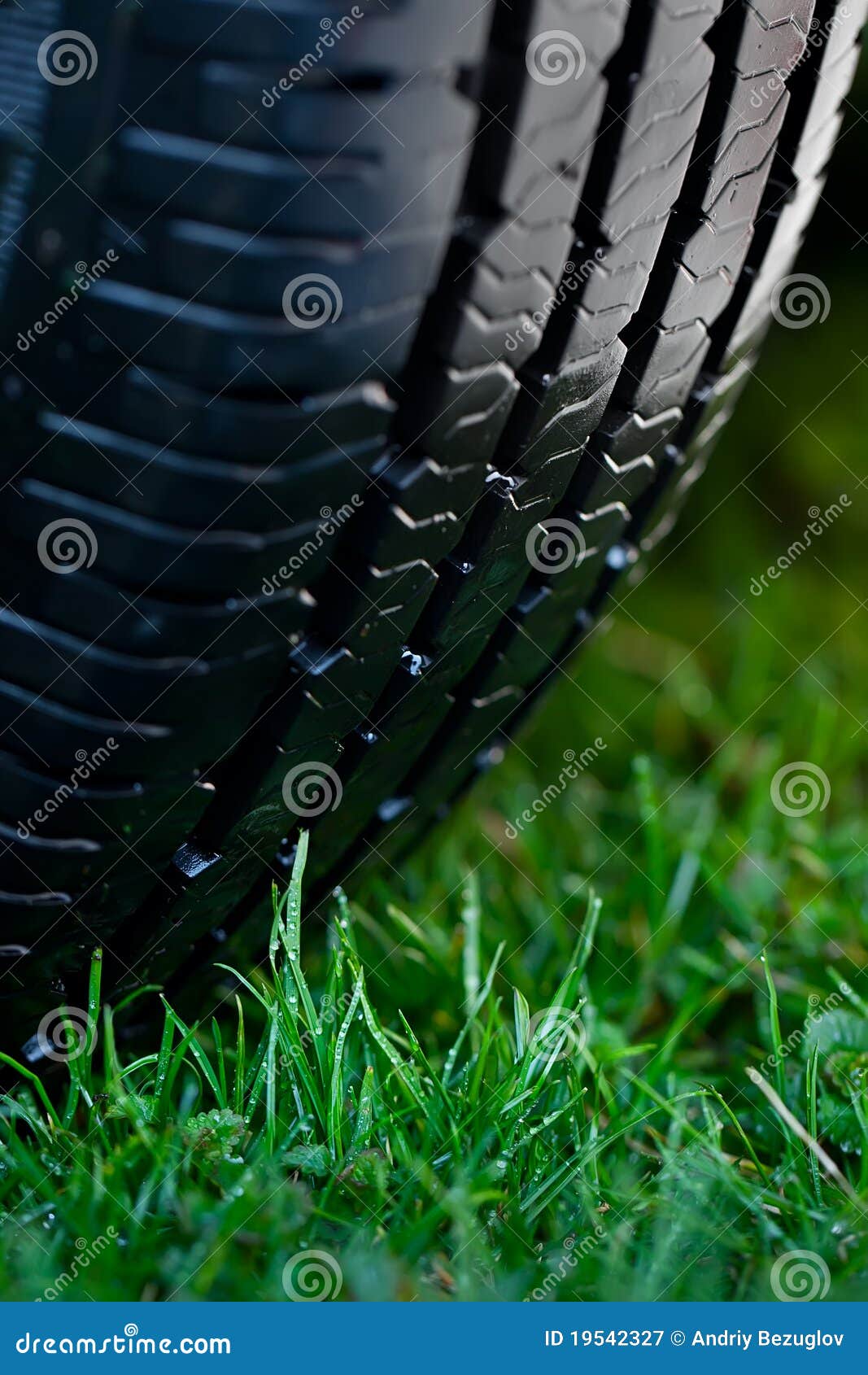 Wheel on the grass stock image. Image of grass, black - 19542327