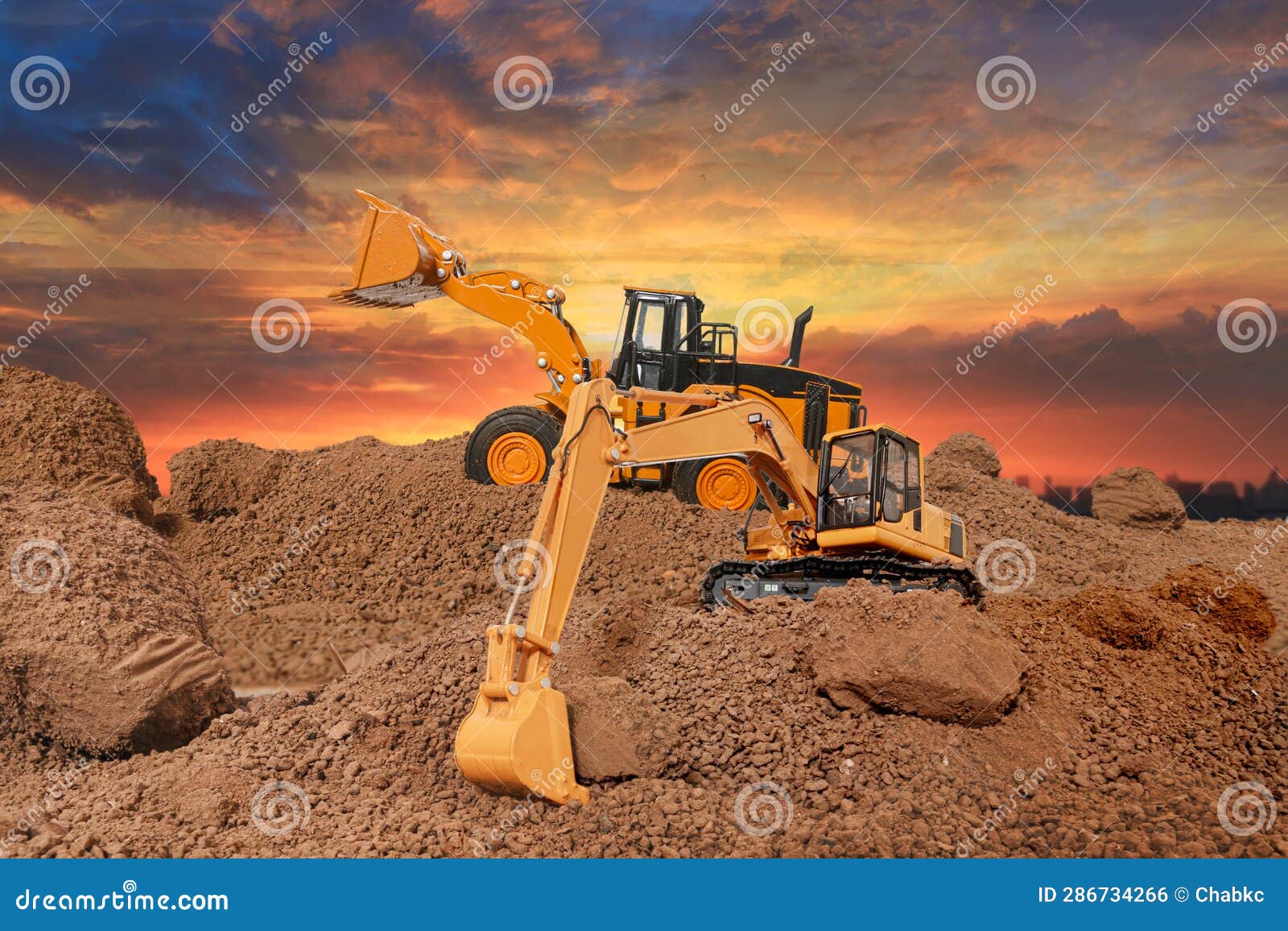 Wheel Loader and Crawler Excavator are Digging the Soil Stock Photo ...