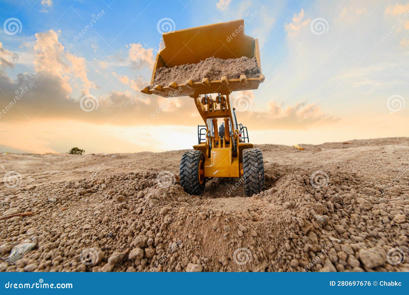 Wheel Loader are Digging the Soil in Construction Site with Bucket Lift ...