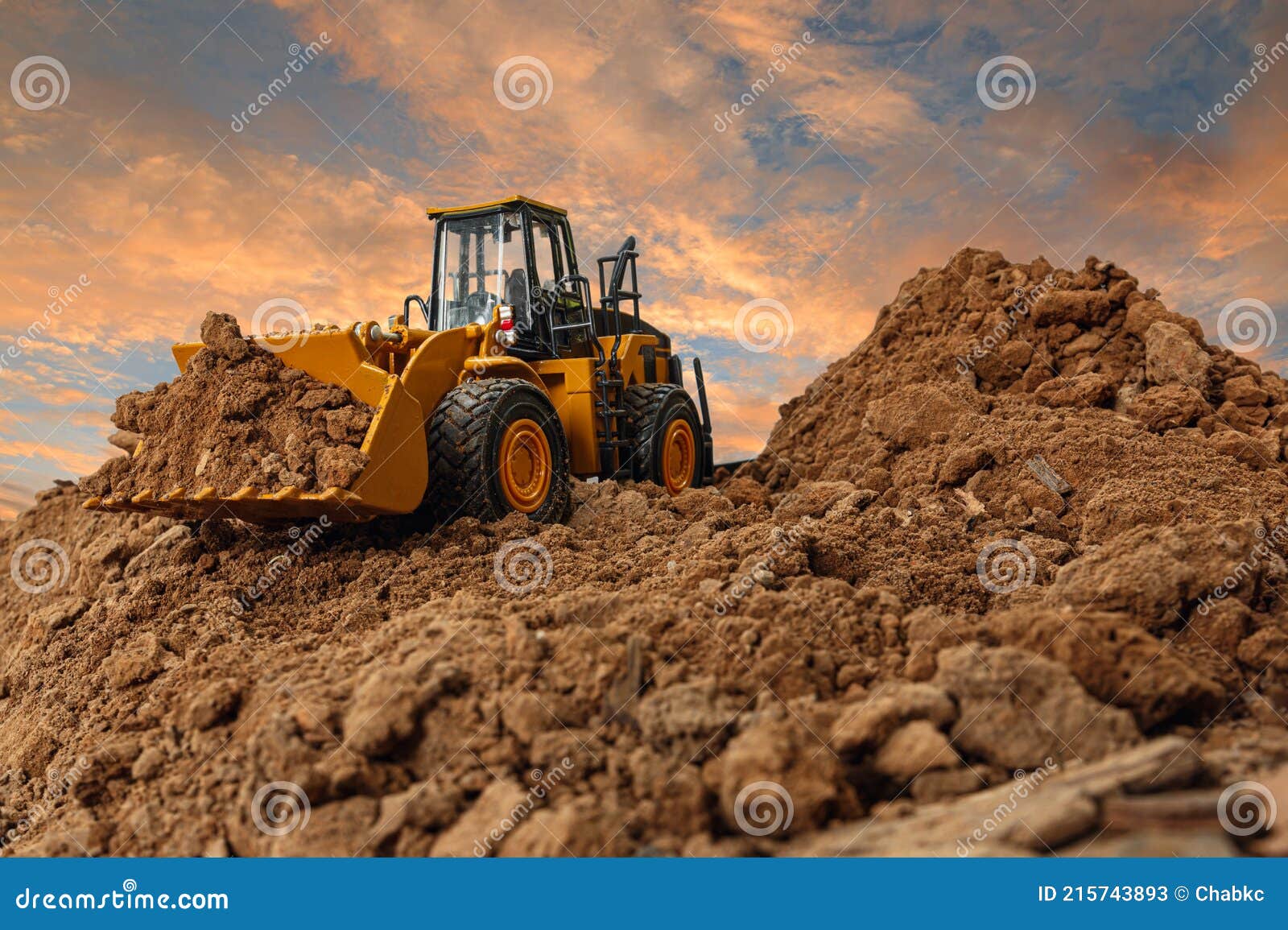 Wheel Loader are Digging the Soil in the Construction Site. Stock Image ...