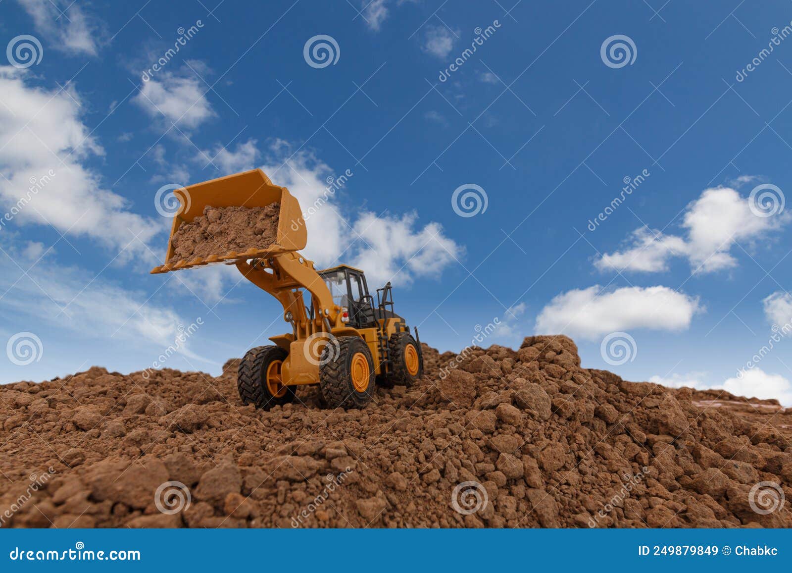 Wheel Loader are Digging the Soil in the Construction Site on Sky ...