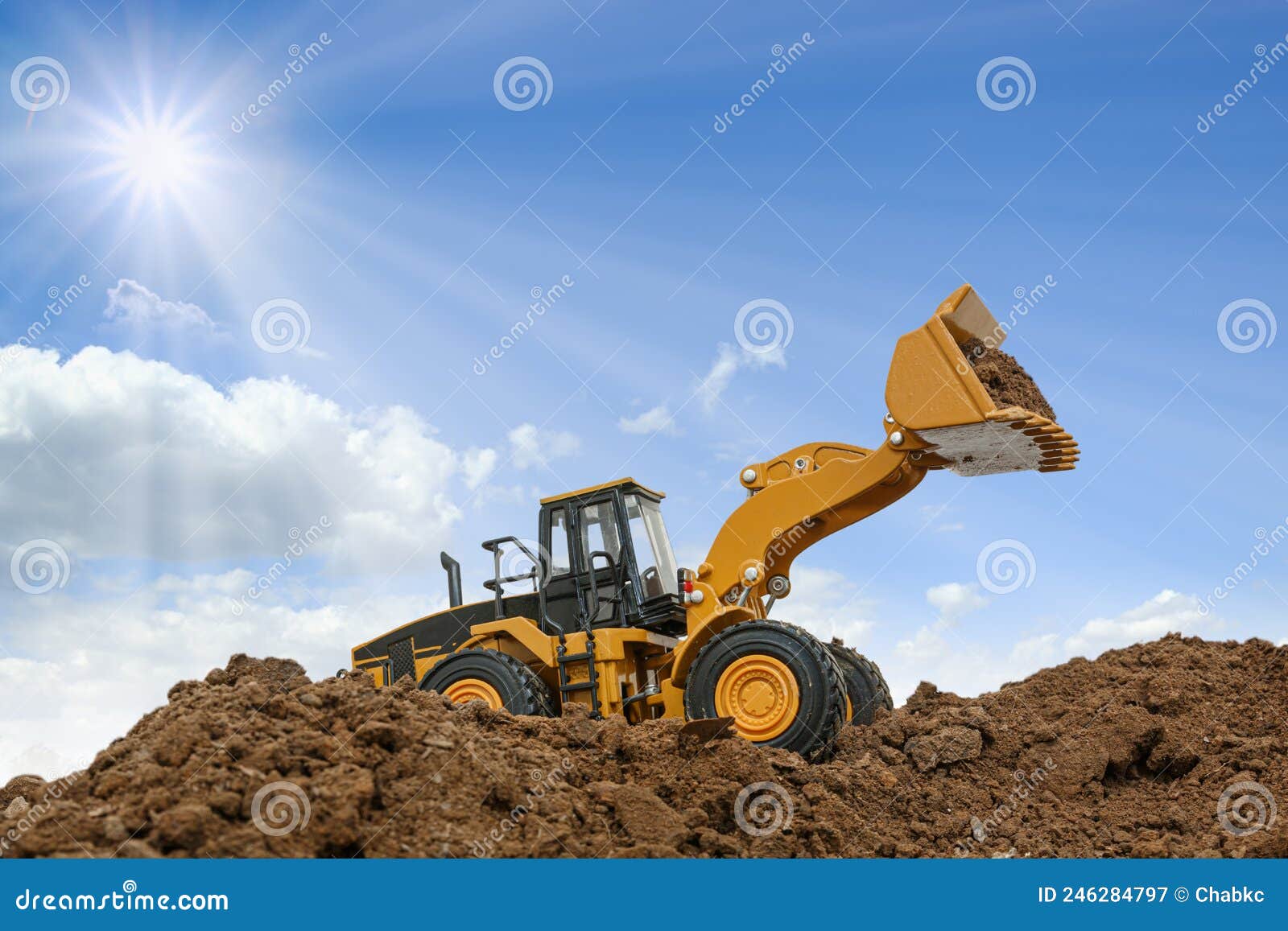 Wheel Loader are Digging the Soil in the Construction Site. Stock Image ...