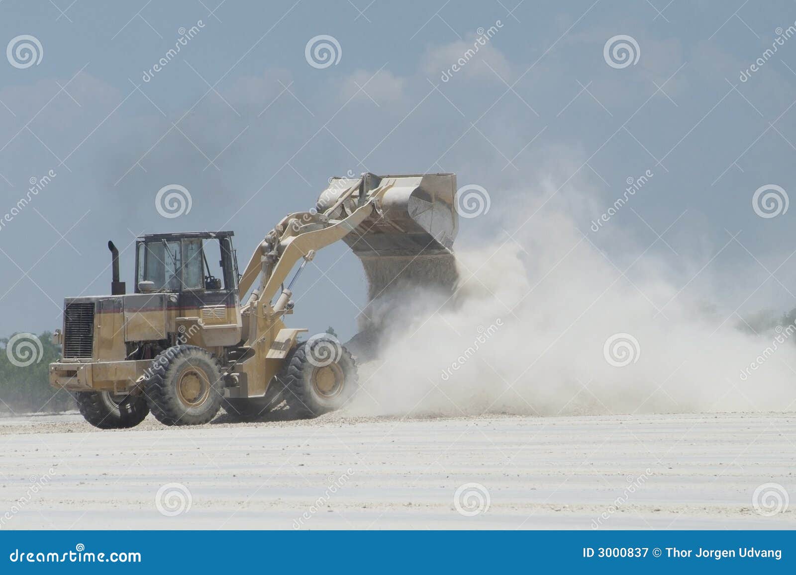 Wheel loader and dust stock image. Image of lime, wheel - 3000837