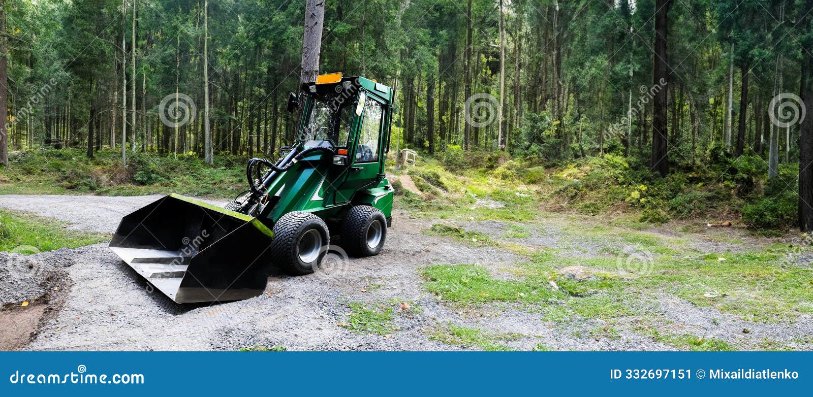 Wheel Loader Excavator and Background of Forest and Trees. Heavy ...