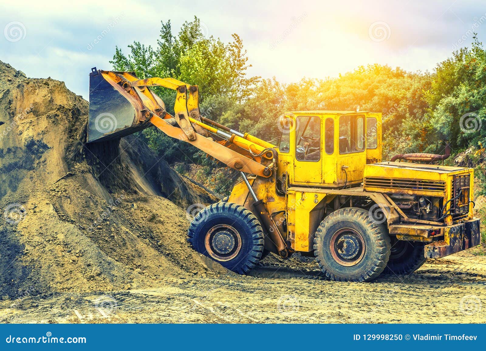 Wheel Loader Excavator with Backhoe Loading Sand at Eathmoving Works in ...