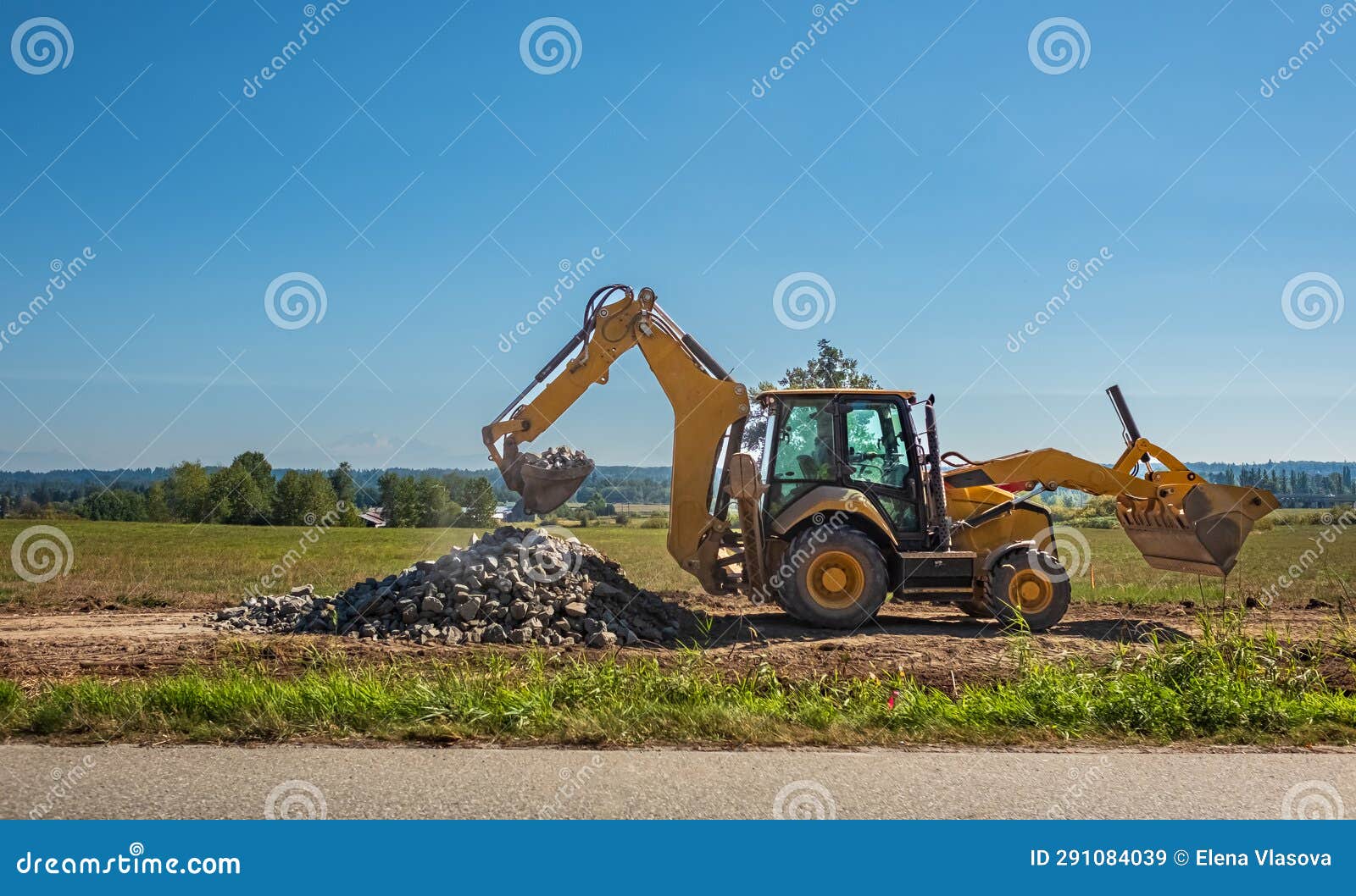 Wheel Loader Excavator with Field Background during Earthmoving Work ...