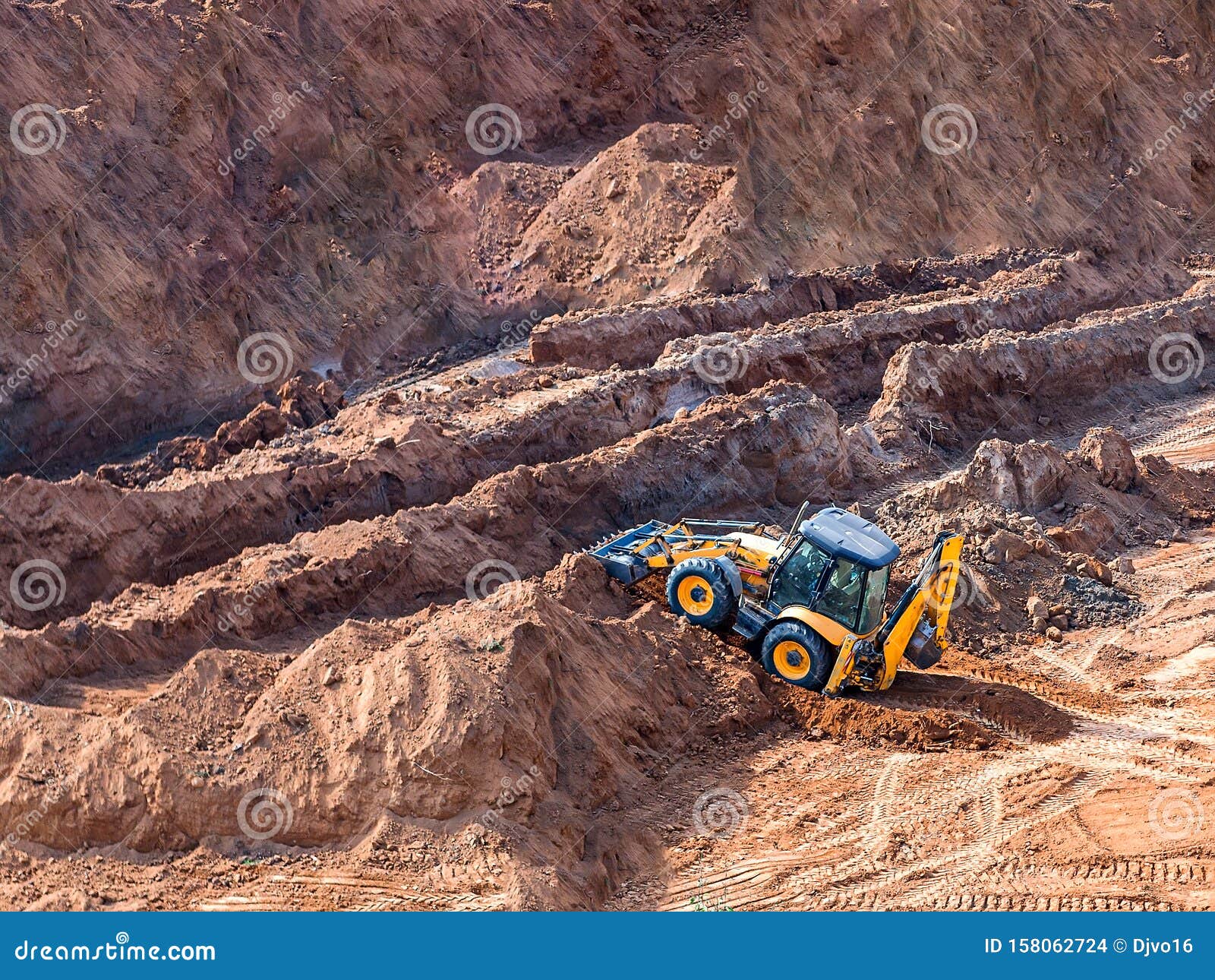 Wheel Loader Excavator Machine Working in Construction Site. Wheel ...