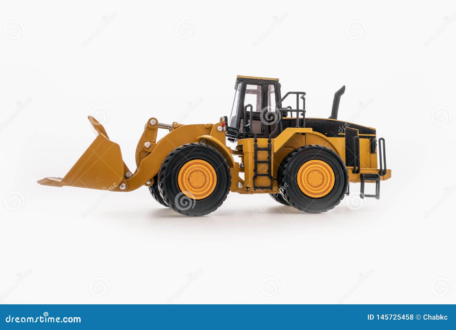 Yellow wheel loader model stock photo. Image of copy - 145725458
