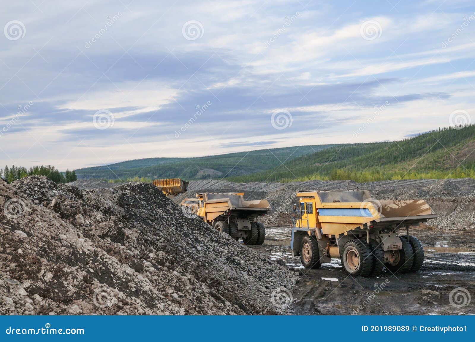 Dump Truck and Wheel Loader in Operation. Mining. Stock Image - Image ...